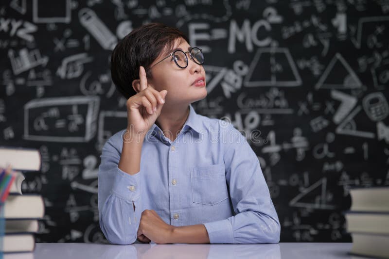 The Teacher Sat Thinking about Teaching in the Classroom Stock Photo ...