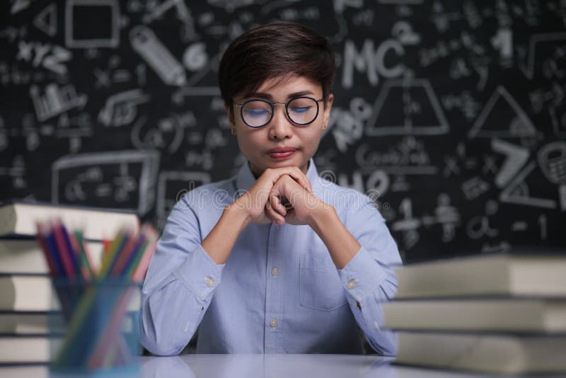 The Teacher Sat Thinking about Teaching in the Classroom Stock Photo ...