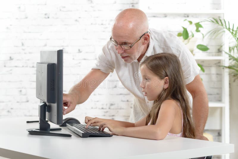 Teacher and a School Girl with a Computer Stock Image - Image of work ...