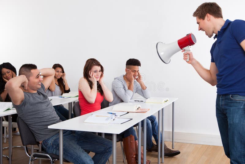 Teacher Shouting through Megaphone on University Students Stock Image ...