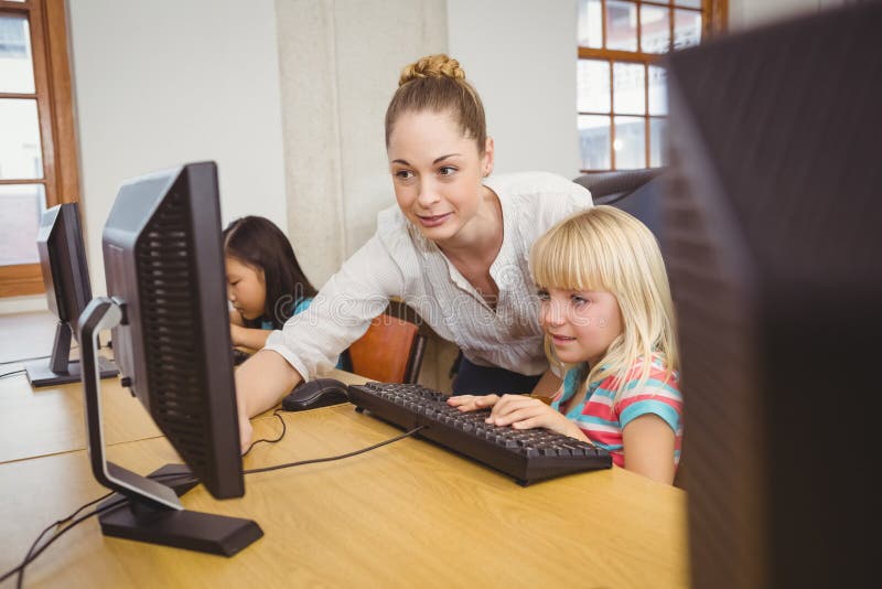 Teacher Showing Student How To Use a Computer Stock Image - Image of ...