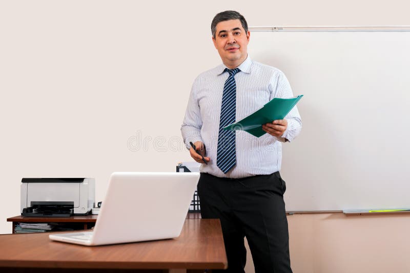 Teacher Stands in Front of Blackboard Stock Image - Image of cheerful ...
