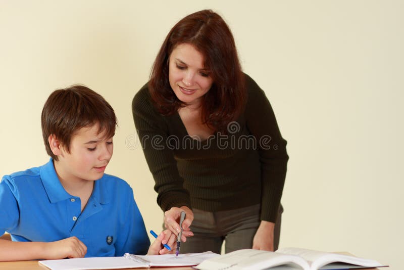 Teacher Helping Student One on One Stock Photo - Image of school ...