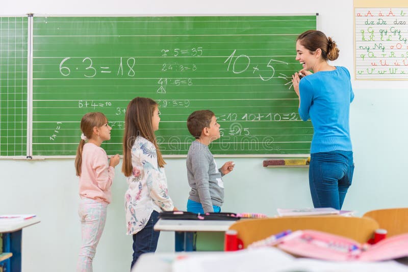 Teacher And Student At The Blackboard, Math Class Stock Image - Image ...