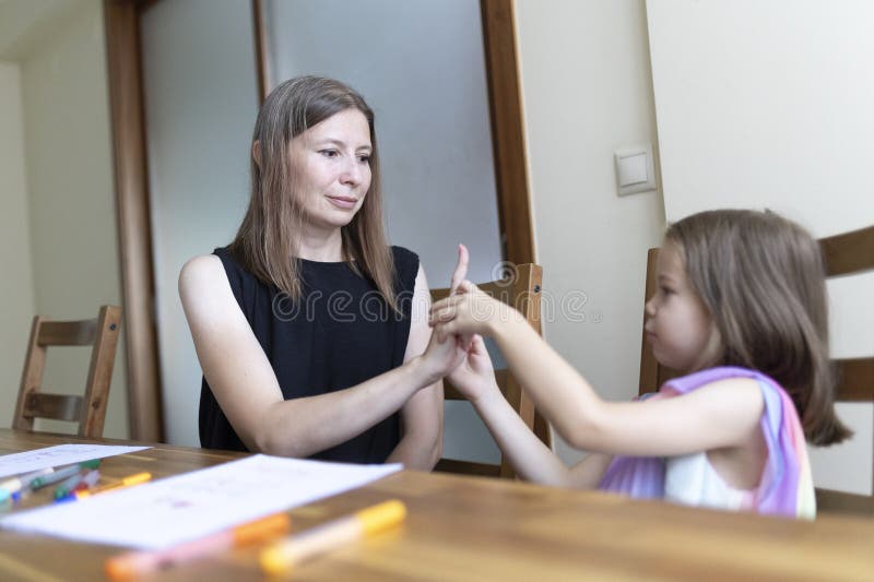 Teacher and Student Communicating Using Sign Language in Classroom Setting Stock Image - Image ...