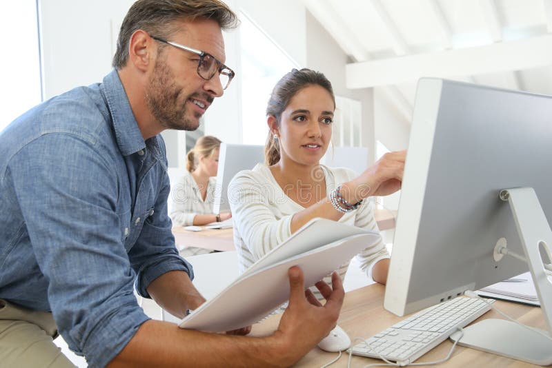 Teacher and Student Discussing about the Topic Stock Photo - Image of ...