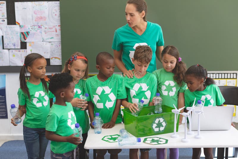 Teacher and Student Interacting Together in Classroom Stock Photo ...