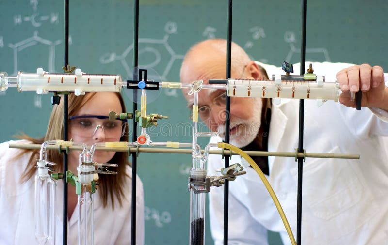 Teacher and Student in a Laboratory Stock Photo - Image of chemistry ...