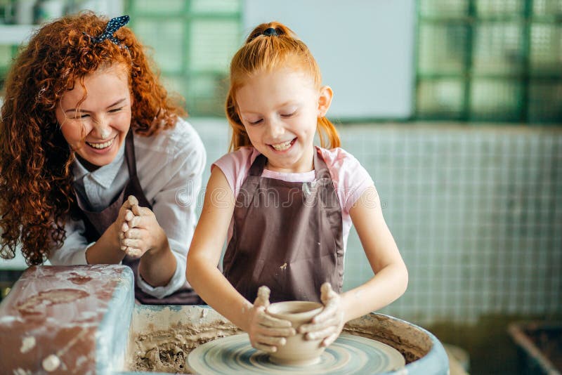 Teacher and Student Make Pitcher of Pottery Wheel Stock Photo - Image ...