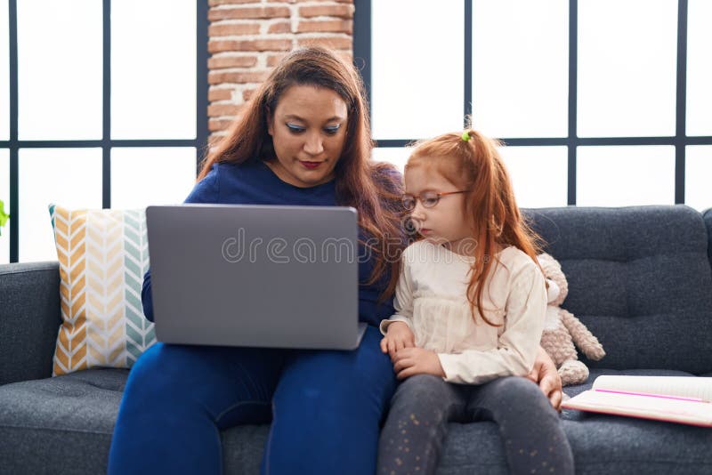 Teacher and Student Using Laptop Sitting on Sofa at Home Stock Image ...