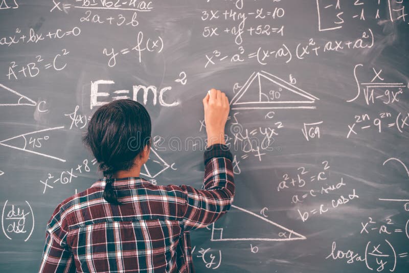 Teacher or Student Writing on Blackboard during Math Lesson in School ...