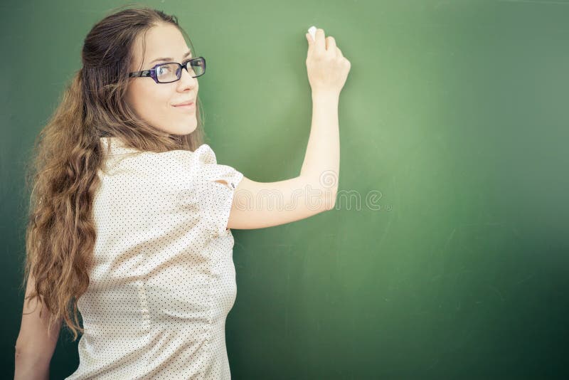 Teacher or Student Wrote on Blackboard with Chalk at Classroom Stock ...
