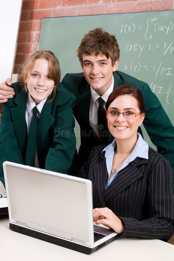 Teacher Teaching Her Student in Class Stock Image - Image of braid ...