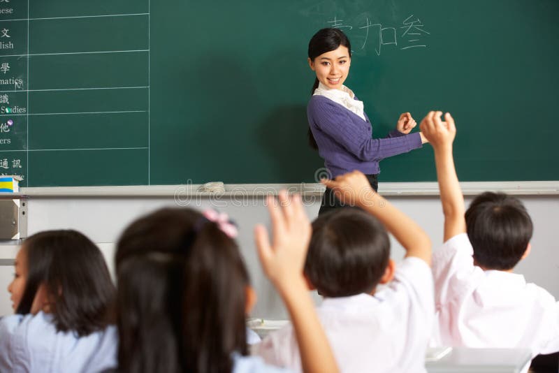 Teacher with Students in Chinese School Classroom Stock Photo - Image ...