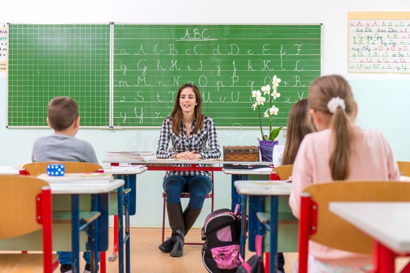 Teacher and Students in the Classroom: Teaching Stock Photo - Image of ...
