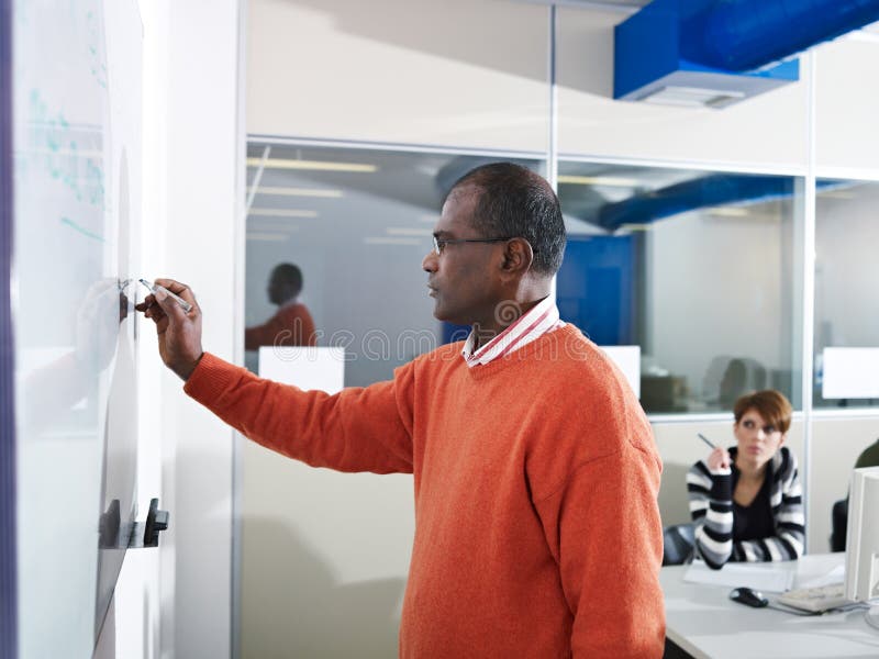 Teacher and Students in College Stock Photo - Image of help, computer ...
