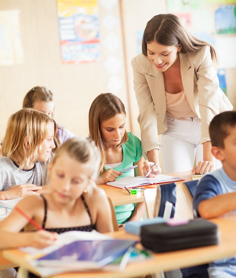 Elementary School Classroom with Teacher Stock Image - Image of ...