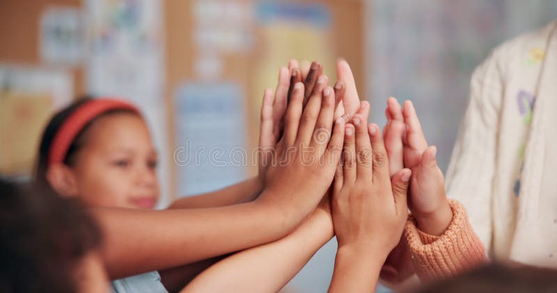 Teacher, Students and High Five in Classroom, Hands and Support with Mind Development at Academy ...