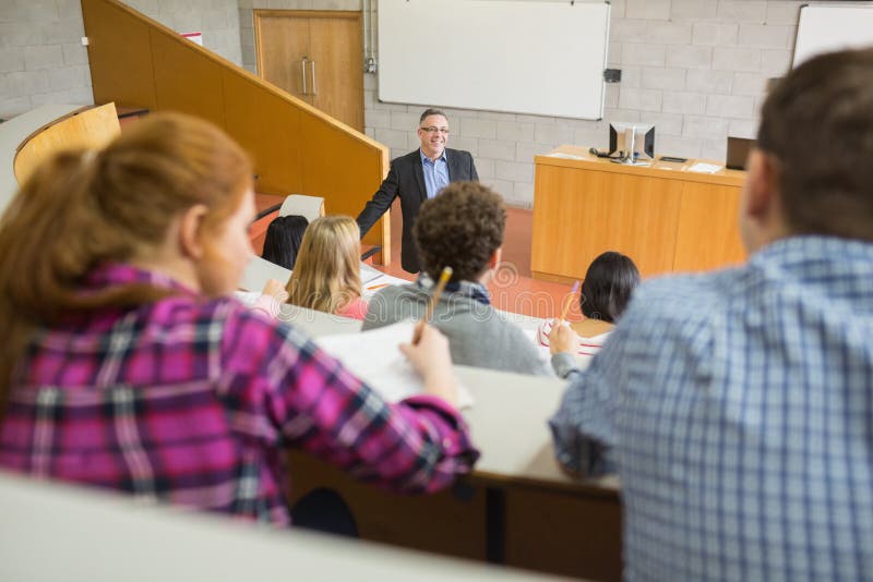 Teacher with Students at the Lecture Hall Stock Image - Image of medium ...