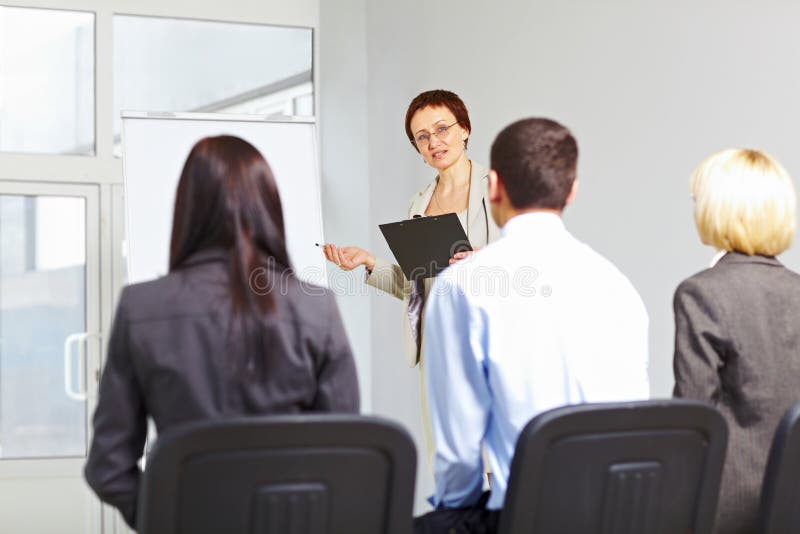 Teacher with Students on Seminar Stock Photo - Image of grade ...