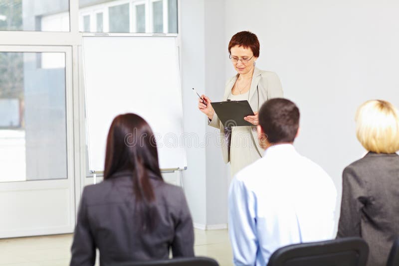 Teacher with Students on Seminar Stock Photo - Image of grade ...