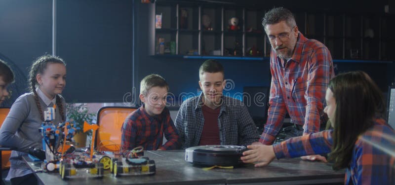 Teacher and Students Using 3D Printer Stock Photo - Image of ...