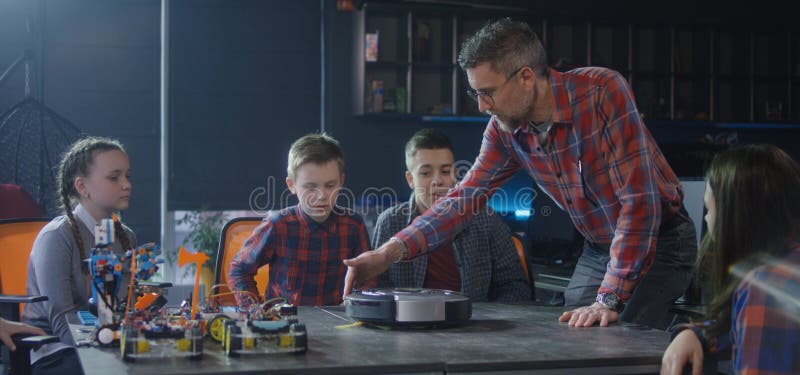 Teacher and Students Using 3D Printer Stock Photo - Image of students ...