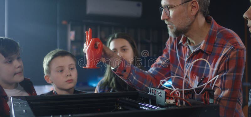 Teacher and Students Using 3D Printer Stock Photo - Image of education ...