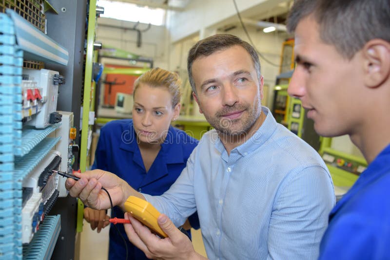 Teacher with Students in Workshop Stock Image - Image of board, teach ...