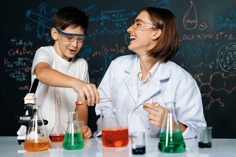 Teacher Support Schoolboy Mixing Solution in Laboratory STEM Class ...