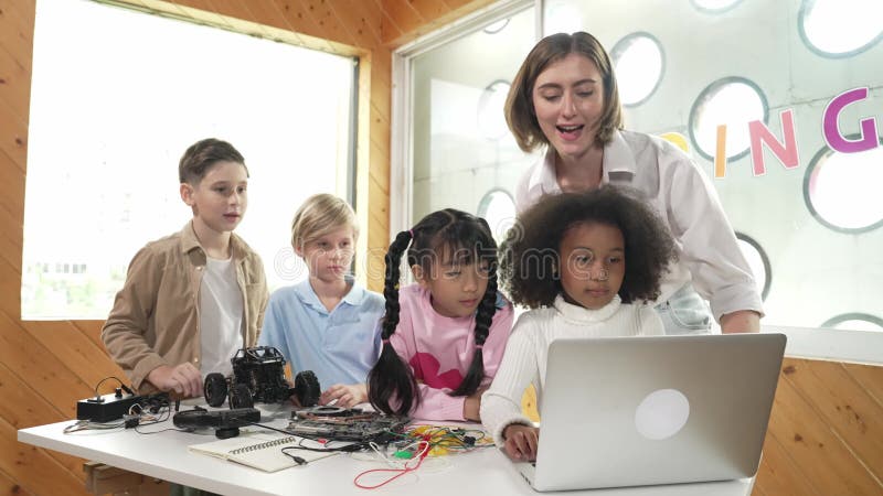 Smart Teacher Teaching Students about Car Model or Electrical Tool ...