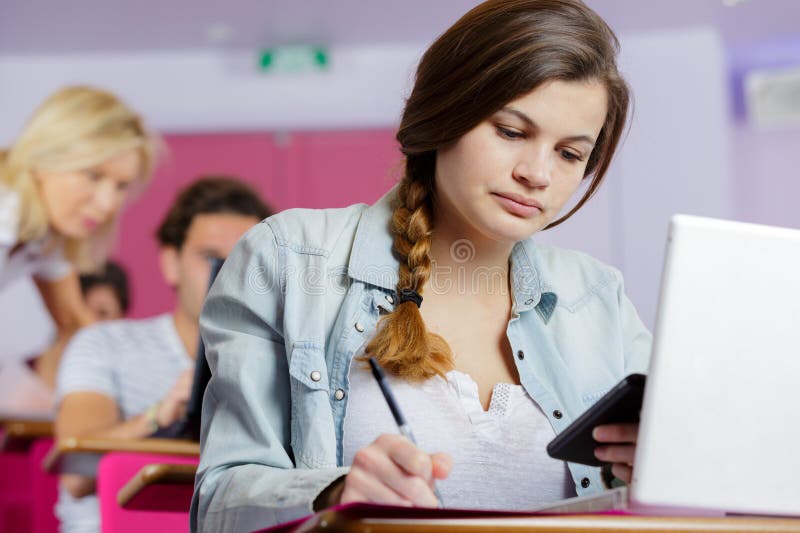 Teacher Teaches Students Using Laptops in Classroom Stock Photo - Image ...