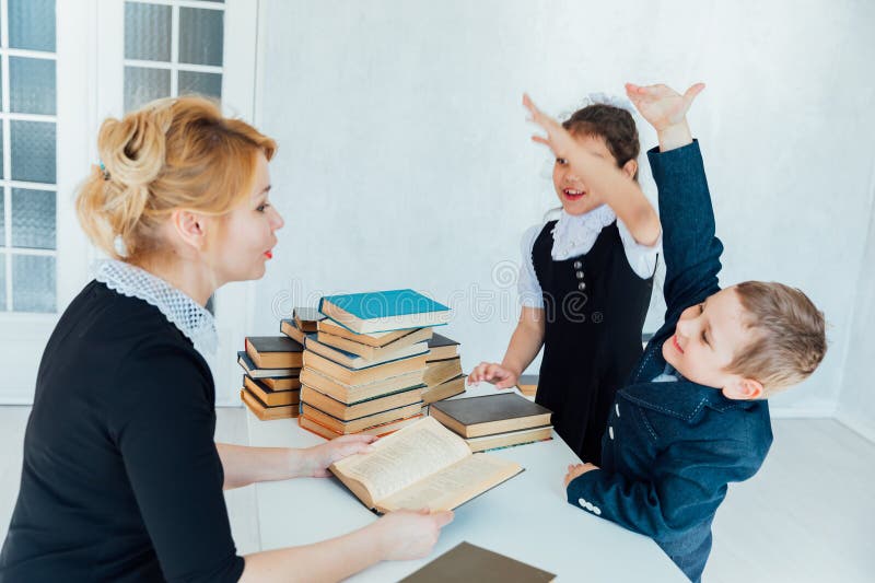 Teacher Teaching Children in School Classroom Stock Photo - Image of ...