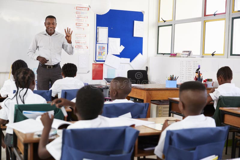 Teacher Teaching an Elementary School Class of Kids Stock Photo - Image ...