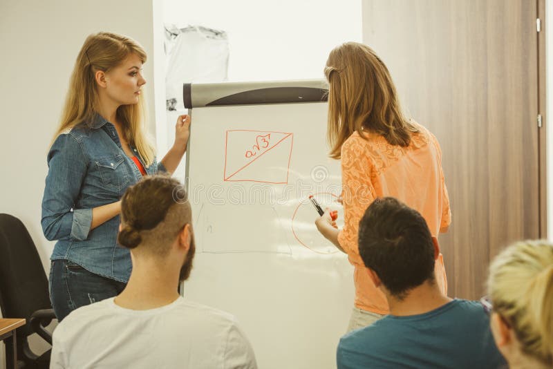 Teacher Teaching Mathematics To College Students Stock Image - Image of ...