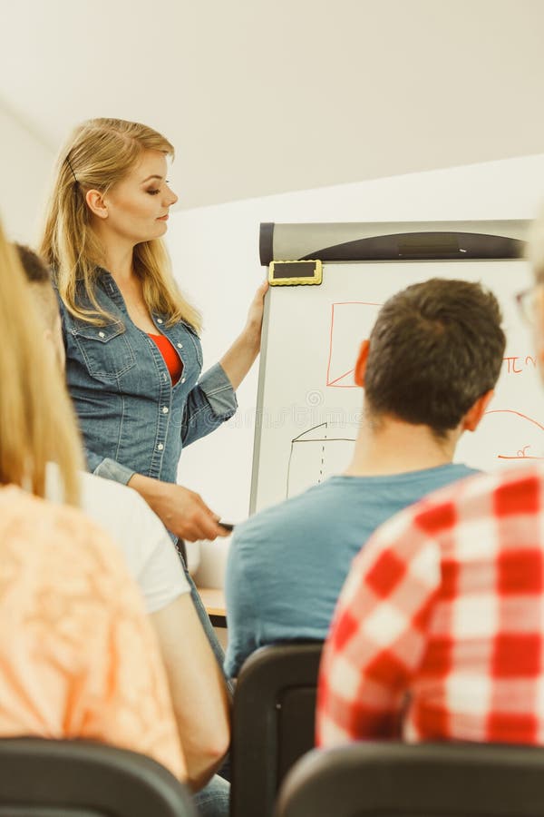Teacher Teaching Mathematics To College Students Stock Photo - Image of ...