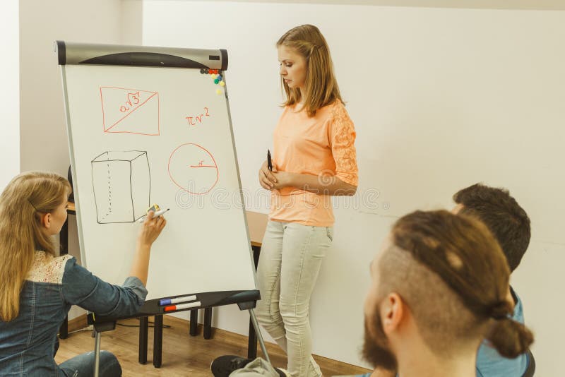 Teacher Teaching Mathematics To College Students Stock Image - Image of ...