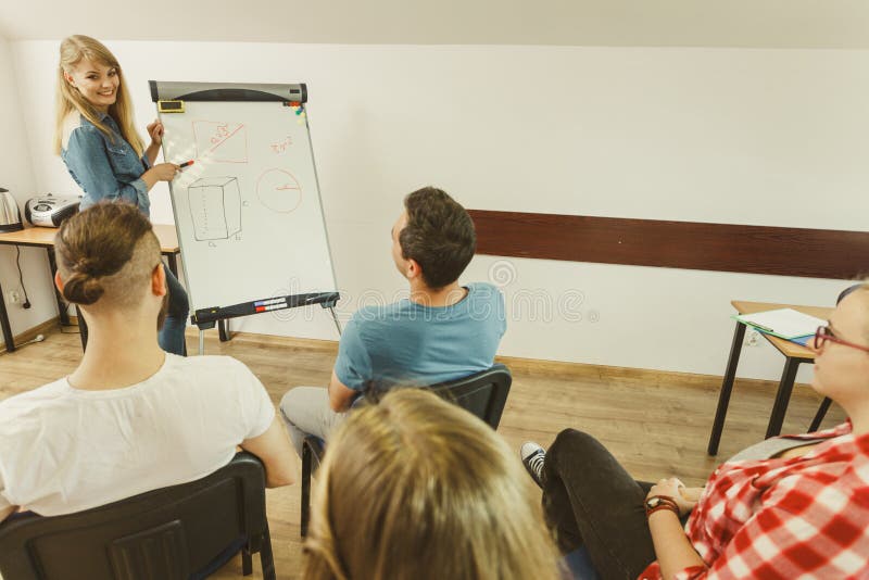 Teacher Teaching Mathematics To College Students Stock Photo - Image of ...