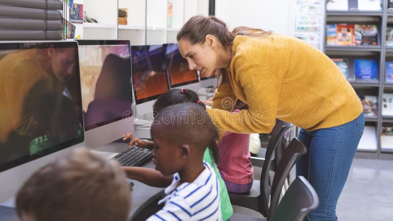 Teacher Teaching Student in Computer Room Stock Photo - Image of ...