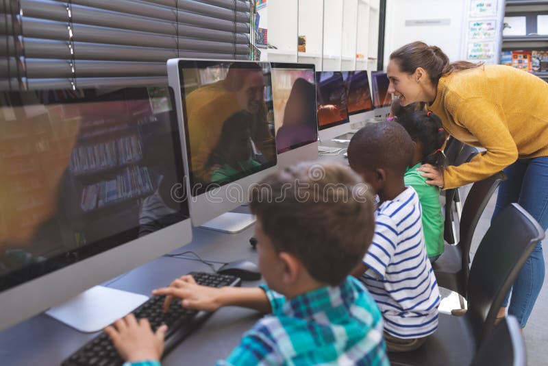 Teacher Teaching Student in Computer Room Stock Image - Image of ...