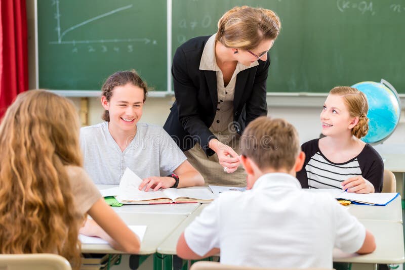 Teacher Teaching Students Geography Lessons In School Stock Image ...