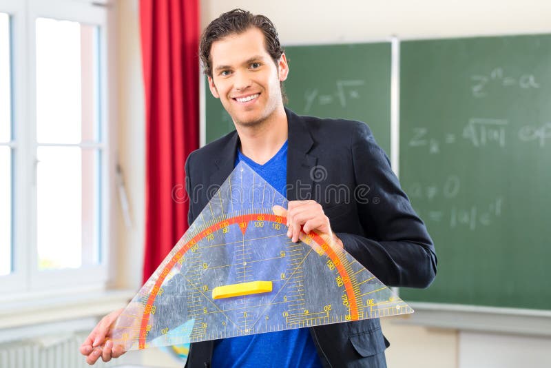 Teacher with Triangle in Front of a School Class Stock Photo - Image of ...