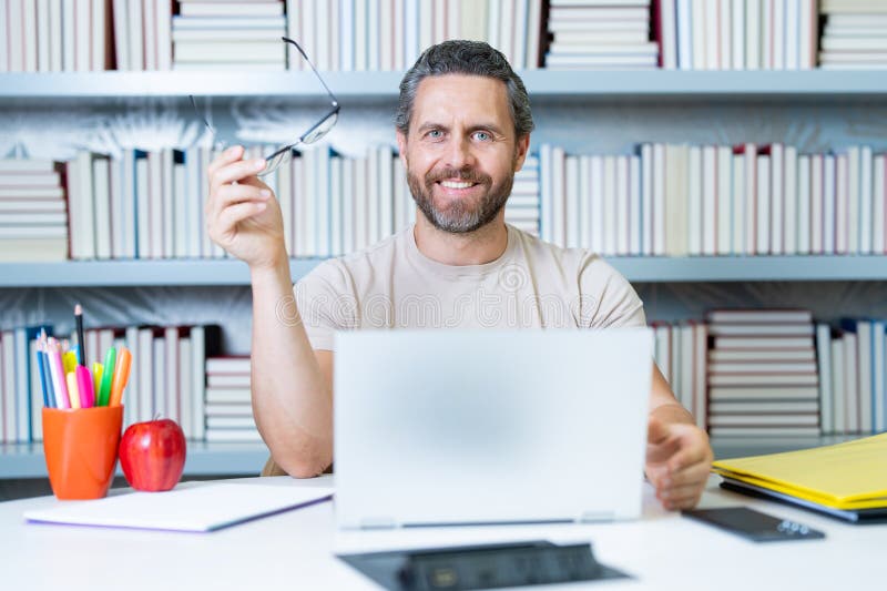 Teacher Tutor with Laptop in School Classroom. Knowledge, Education ...