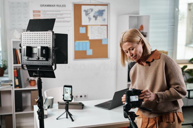 Teacher Using Professional Camera for Online Lesson Stock Photo - Image ...