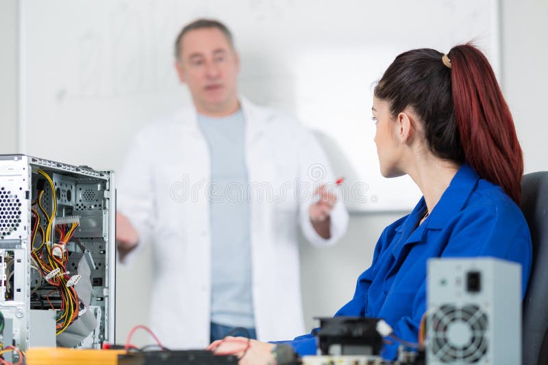 Teacher at Whiteboard Student with Dismantled Computer Stock Image ...