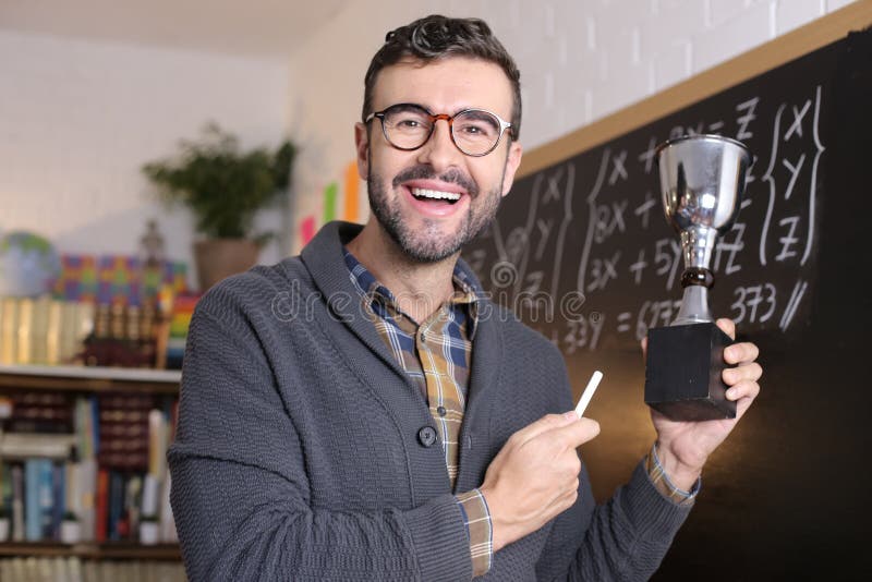 Teacher Winning Silver Trophy in Classroom Stock Image - Image of class ...
