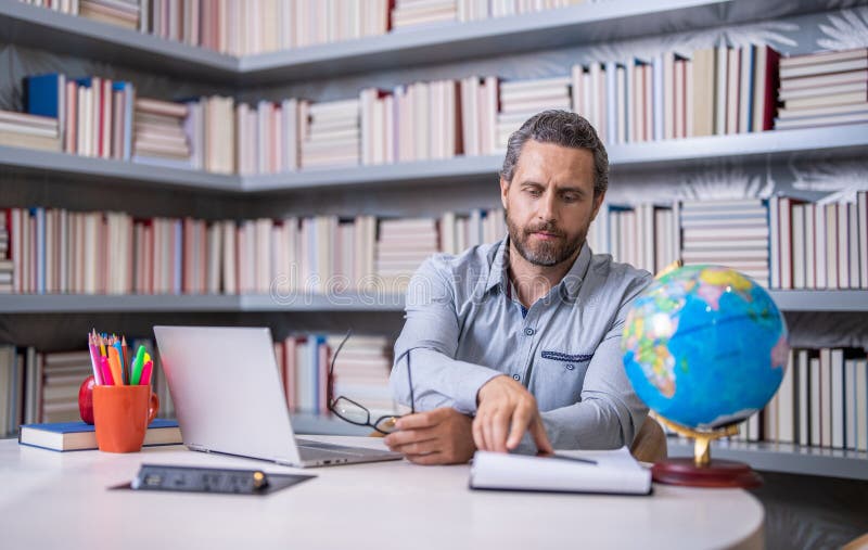 Teacher Work on Laptop. Teacher Do Remote Education with Virtual ...