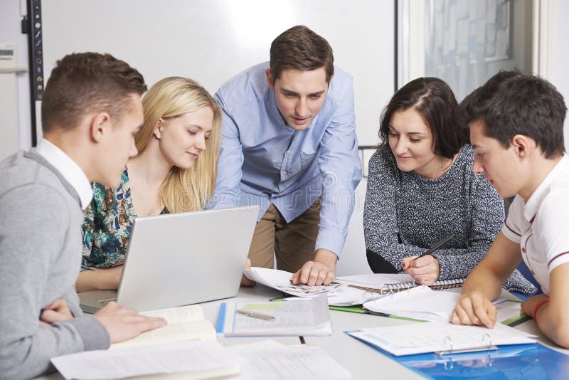 Teacher Working in Classroom with Students Stock Image - Image of ...