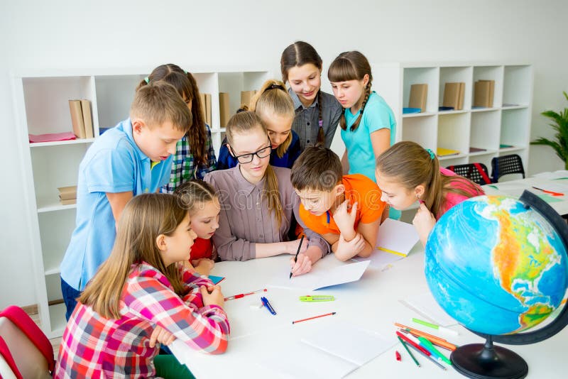 Teacher Works with Students Stock Image - Image of female, student ...
