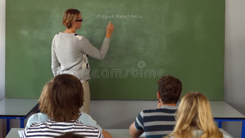 Teacher Writing on Blackboard – Animated Classroom Scene Stock Video ...